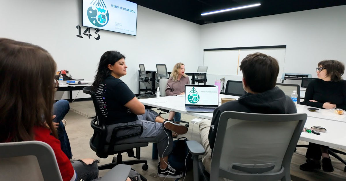 Graphic arts students work with clients to elevate their brand